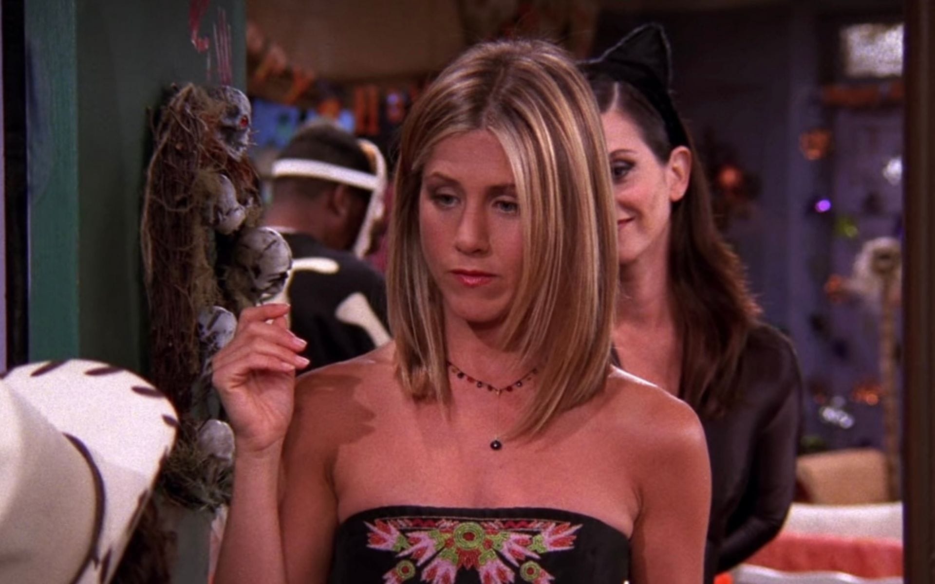 Rachel Green wearing iconic and trendy outfits in Friends