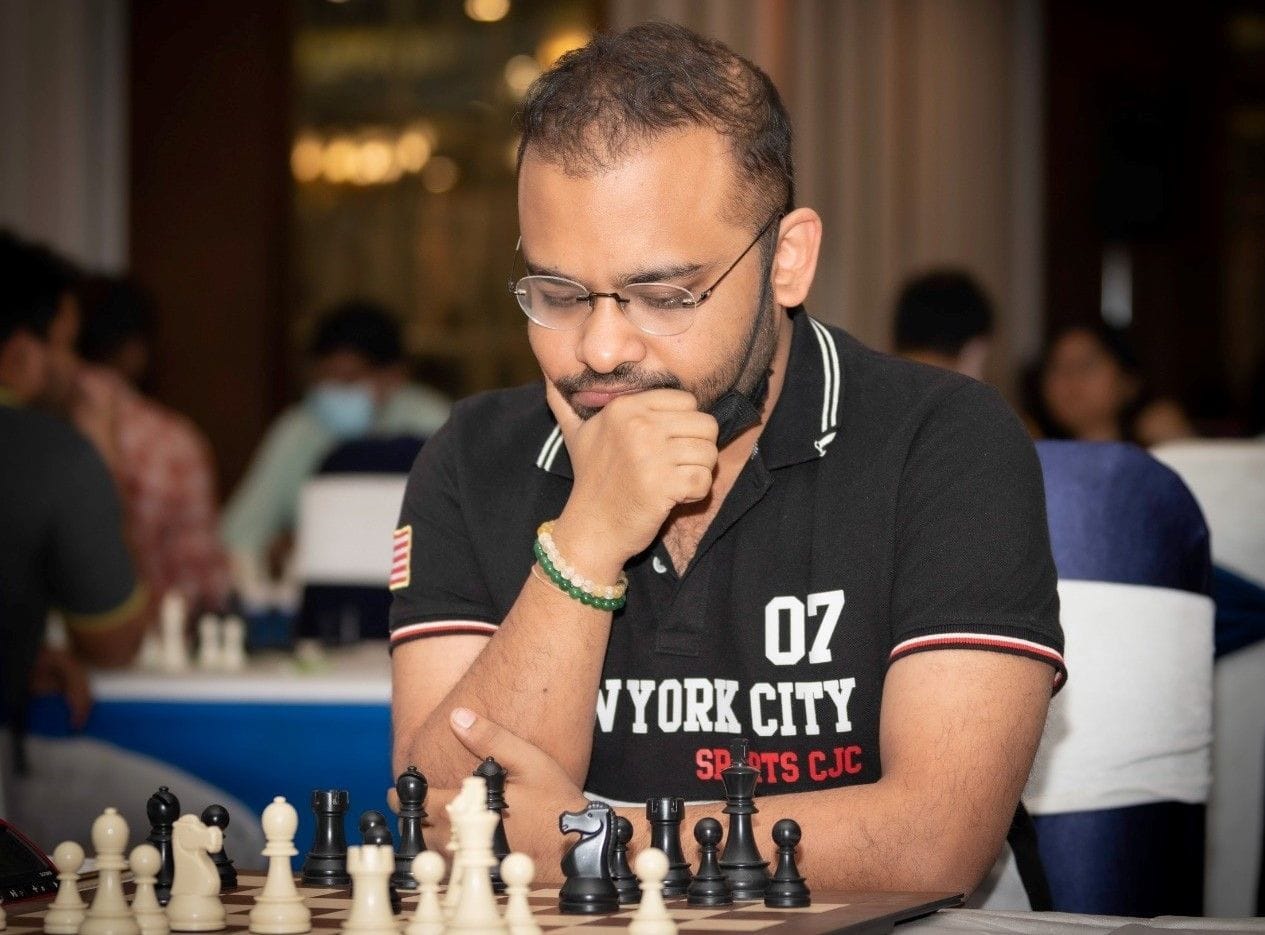 Defending champion Abhijeet Gupta back in joint lead at Delhi ...