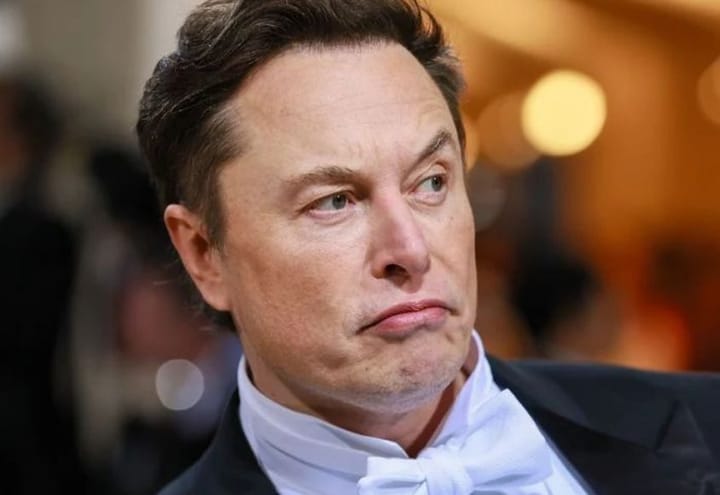 How tall is Elon Musk?