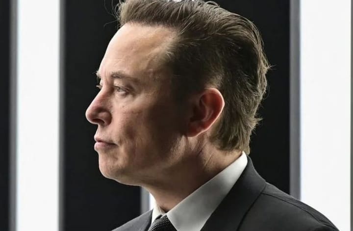 How tall is Elon Musk?