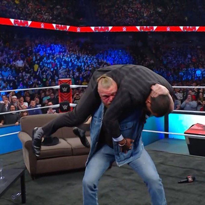 How tall are WWE stars Brock Lesnar and Omos? Real heights revealed ...