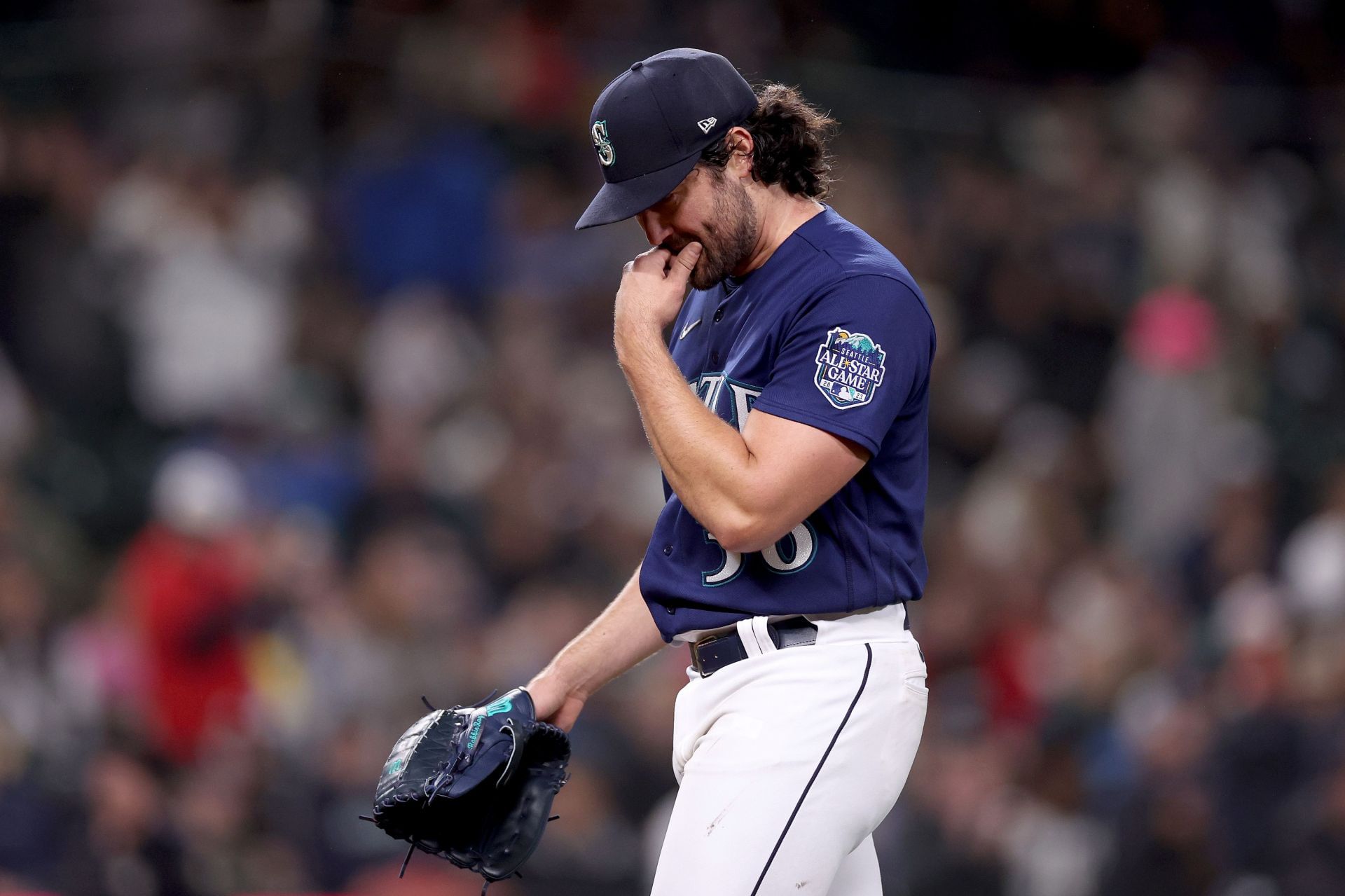 Seattle Mariners fans dejected as starting pitcher Robbie Ray is done ...