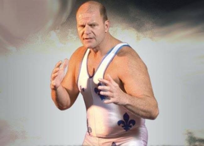 Who was Kevin Owens trained by?