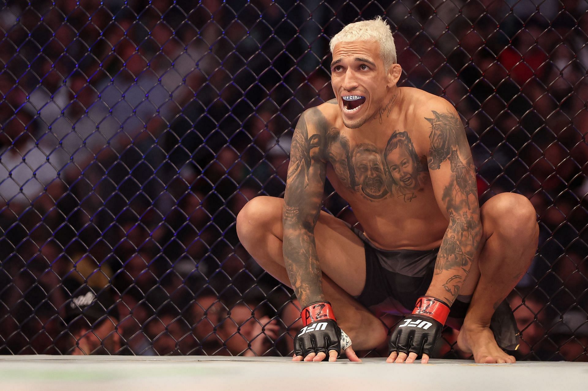 Why did Charles Oliveira dye his hair?